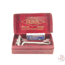 Vintage Rare red boxed Redox Rolling Razor
